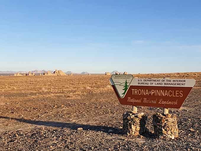 The Bureau of Land Management sign marks the entrance, but nothing fully prepares you for what's waiting down that dirt road.