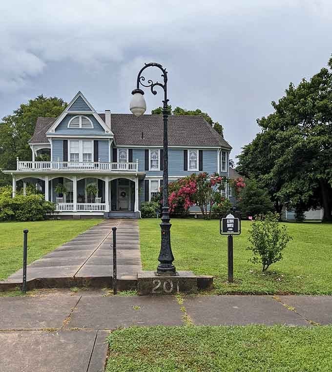 That ornate lamppost standing guard out front says this Victorian beauty has always known exactly how special it is.