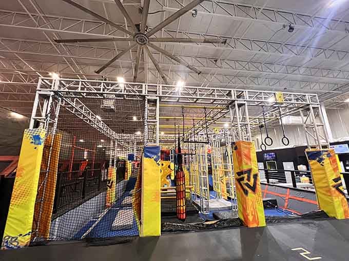 This obstacle course looks innocent until you're dangling from those rings, questioning every life choice you've made.