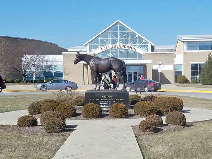 A bronze horse standing guard outside Falling Springs Center, because in Woodford County, horses get the best parking spots.