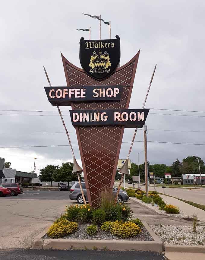 That vintage roadside sign has been pointing hungry people in the right direction for a very long time.