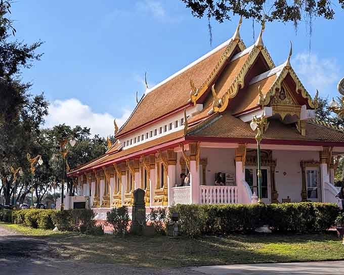 Draped in gold and framed by Spanish moss, this temple exterior is genuinely one of Florida's finest sights.