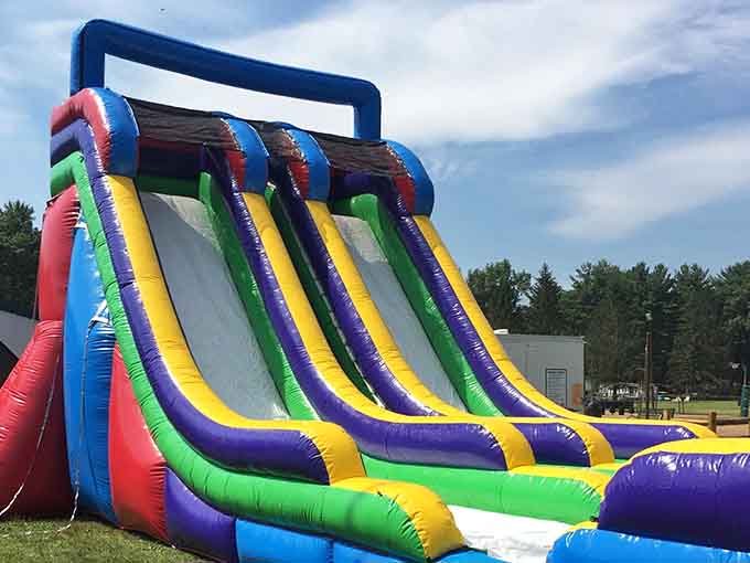That inflatable slide is basically a skyscraper for anyone under twelve, and honestly, for a few adults too.