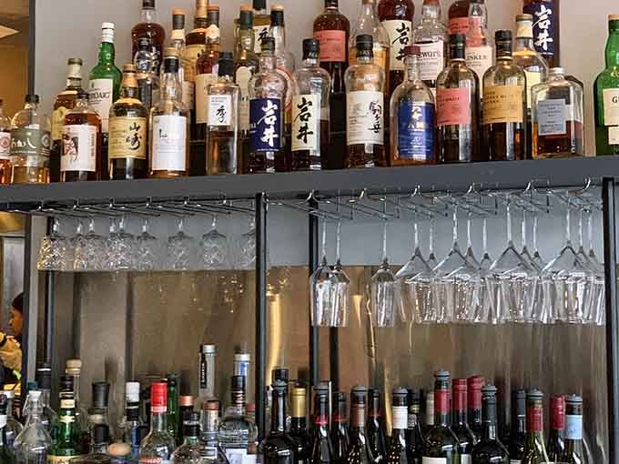 That bar shelf stacked with Japanese whisky bottles explains the name and raises the expectations simultaneously.