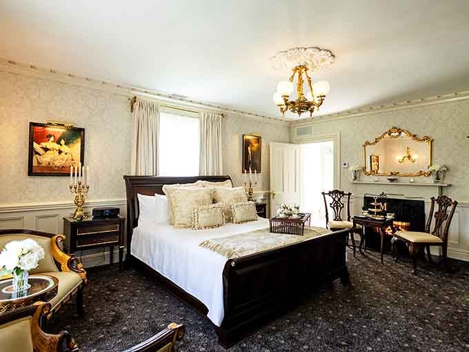 A bedroom this beautifully appointed makes you want to cancel your return plans entirely. Gold chandelier included.