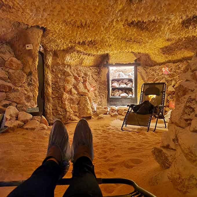 Feet up, worries down, the salt cave view from your zero-gravity chair is better than any office ceiling.