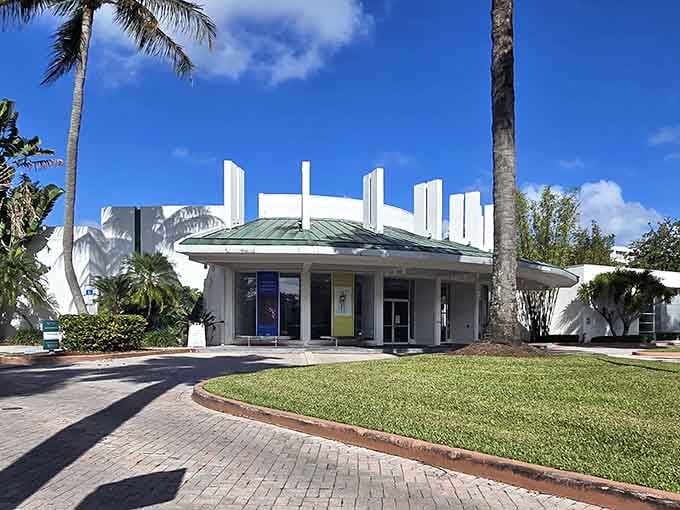Palm trees, a green copper roof, and crisp white walls give the Lowe Art Museum an effortlessly elegant South Florida presence.