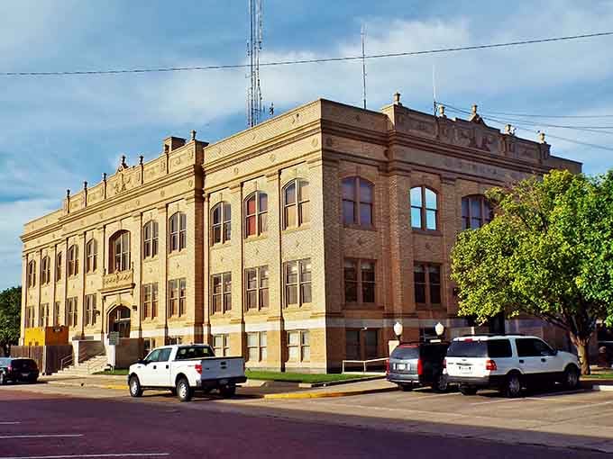 Those arched windows and decorative cornices mean business, the kind of civic ambition that built whole towns.