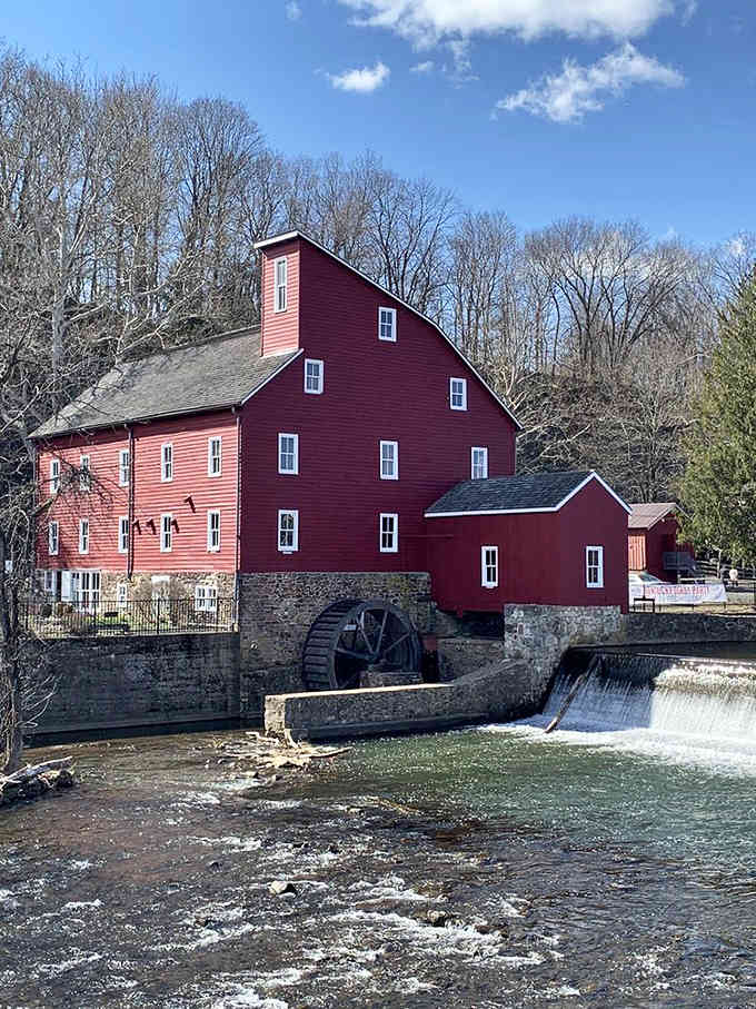That bold red mill and spinning waterwheel beside the rushing river? Honestly, it's the most photogenic thing in all of Clinton.