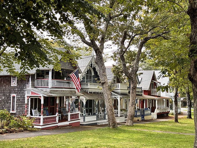 Gingerbread trim and patriotic bunting adorn these historic beauties where porch-sitting becomes an art form worth mastering yourself.