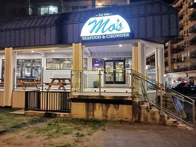Glowing warmly against the Seaside night, Mo's lit-up sign is the most welcoming beacon on the Promenade.