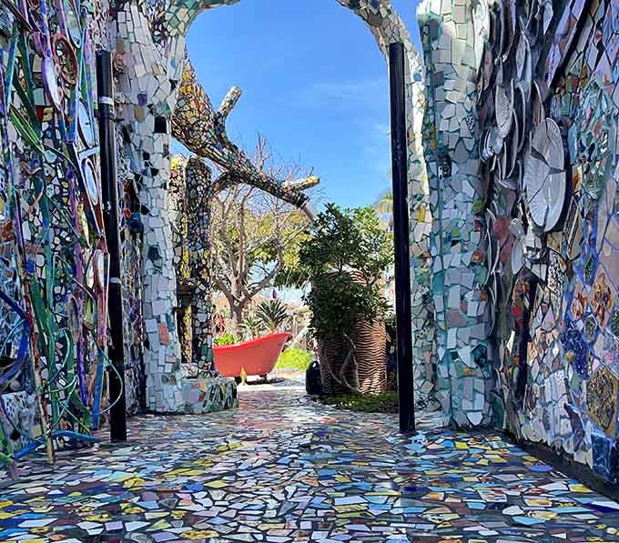 Mosaic archways frame secret gardens beyond, inviting you through portals into pure artistic imagination.