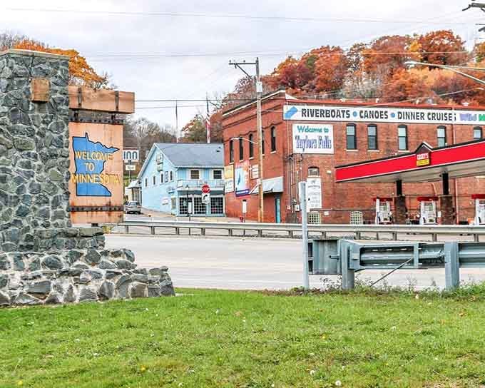 A stone welcome sign, a riverboat canoe operation, and brilliant autumn foliage &mdash; Taylors Falls greets every visitor like the opening scene of a feel-good movie.