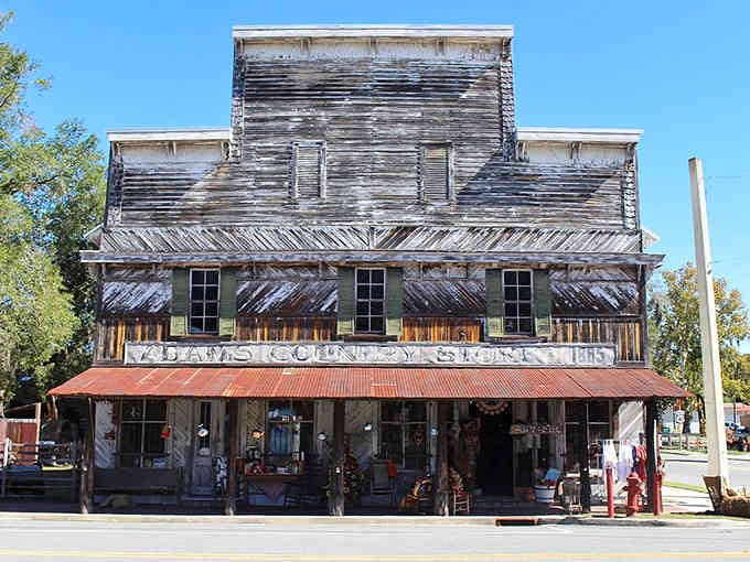 This weathered general store looks like it stepped straight out of a Western movie, complete with vintage gas pumps standing guard.