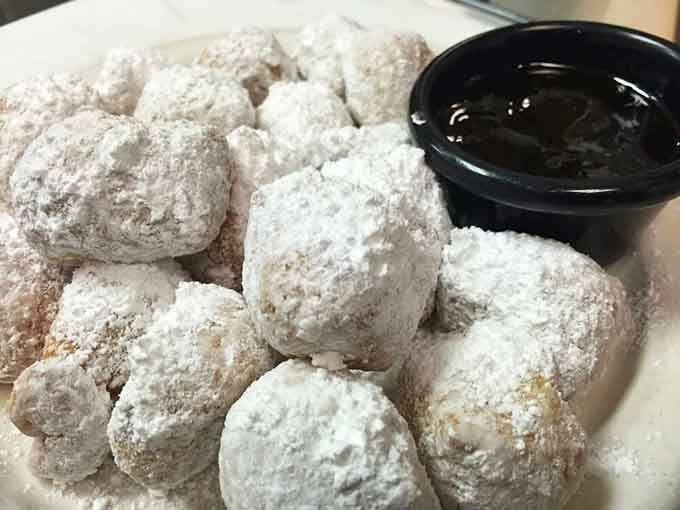 Pillowy, powdered-sugar-dusted zeppoles with a chocolate dipping sauce. These little Italian doughnuts are pure, uncomplicated joy on a plate.