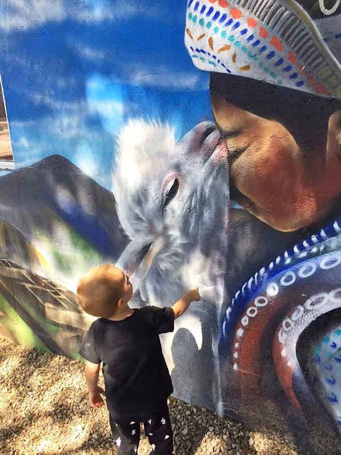 Kids and colorful murals make feeding time an Instagram moment, though the alpacas definitely aren't camera-shy either.