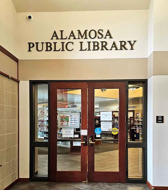 Those wooden doors at the Alamosa Public Library open into a world where every story costs exactly nothing.