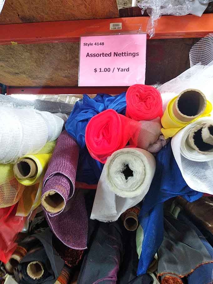 Assorted nettings in bold, bright colors tumbled together, the kind of find that sparks a costume idea instantly.