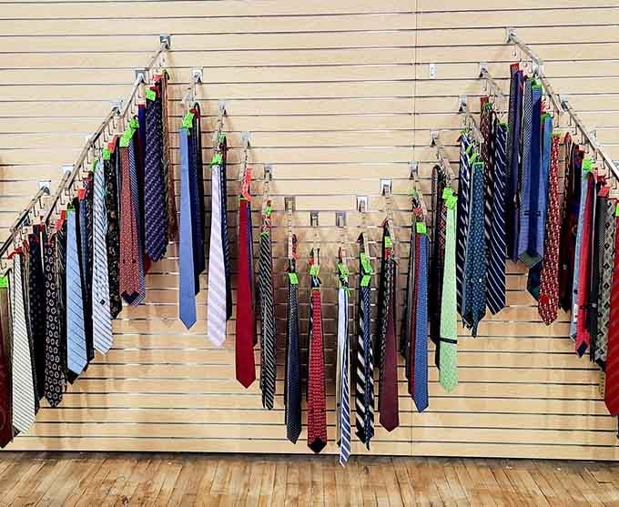 A wall of ties fanned out like a peacock showing off, every pattern and color accounted for beautifully.