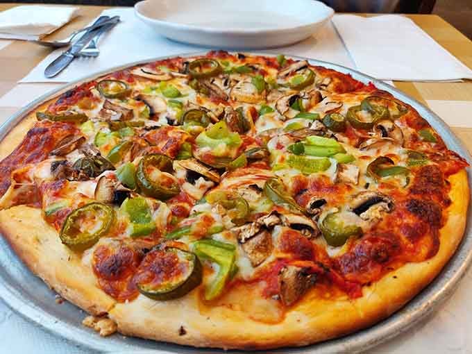 A veggie pizza loaded with jalape&ntilde;os, mushrooms, and green peppers that proves vegetables can absolutely steal the show.