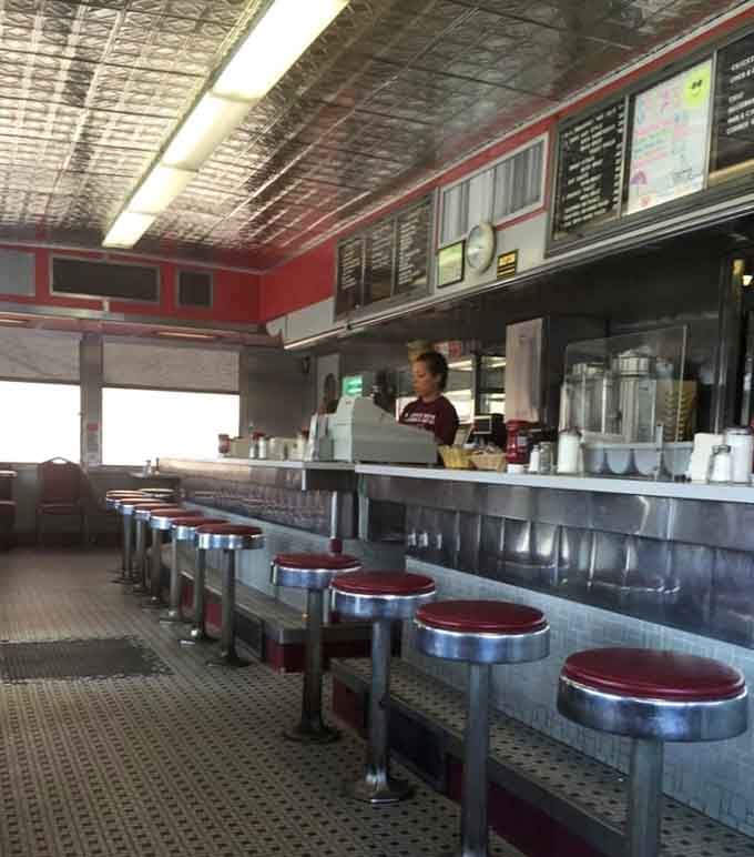 An empty counter at Angelo's is just a temporary situation, those red stools fill up fast and for very good reason.