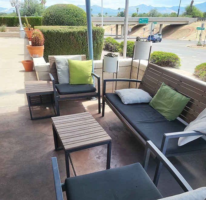 A covered patio with mountain views and comfortable seating. Fresh air and good food are always a winning combination.