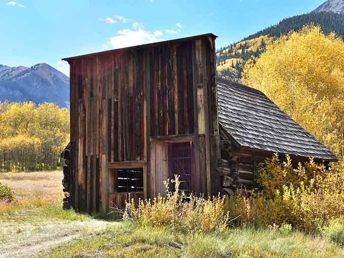 The old post office building stands tall, a reminder that even remote mining camps needed their connection to civilization.