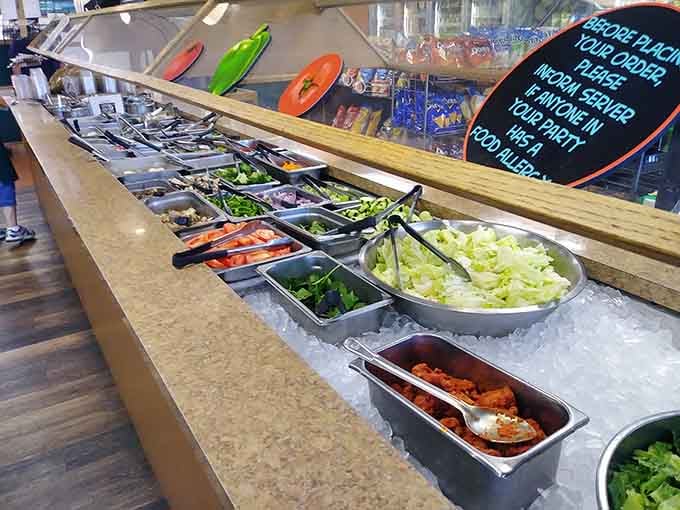 A fresh, well-stocked salad bar loaded with colorful toppings, proof that Augusta's takes every part of the menu seriously.