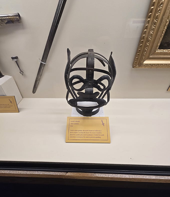 A 16th-century iron Scold's Brank, proof that history occasionally produces objects that are equal parts fascinating and deeply unsettling.
