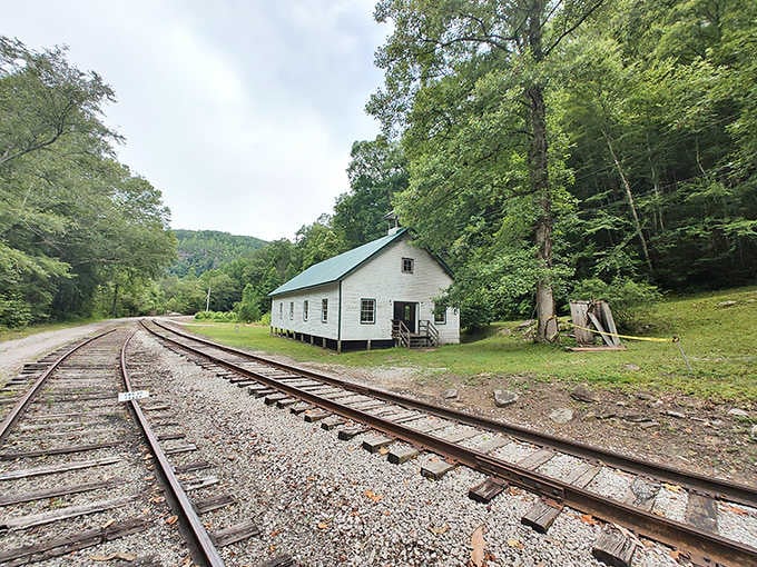 Two sets of tracks, one quiet church, and enough green trees to make any city person seriously reconsider their life choices.