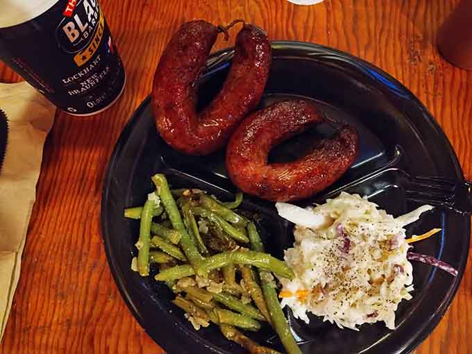 Two sausage rings, green beans, and coleslaw on a plate. Simple, satisfying, and absolutely no apologies needed.
