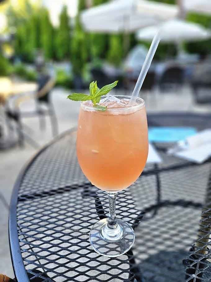 Sangria with a fresh mint garnish sitting pretty on the patio is basically summer vacation in a glass, passport optional.