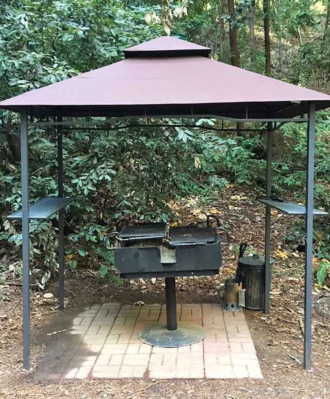 A proper grill station under a gazebo roof means your outdoor cooking game just got a serious upgrade.