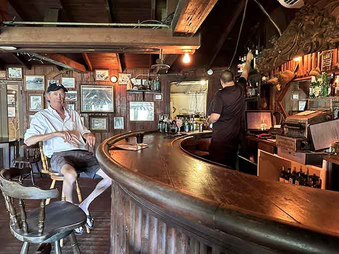 A curved wooden bar, warm light, and a bartender who looks like he knows exactly what you need tonight.