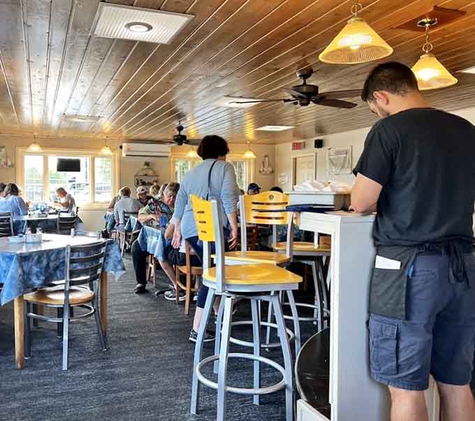 Ceiling fans spin lazily overhead while diners enjoy meals that make vacation mornings worth waking up for early.