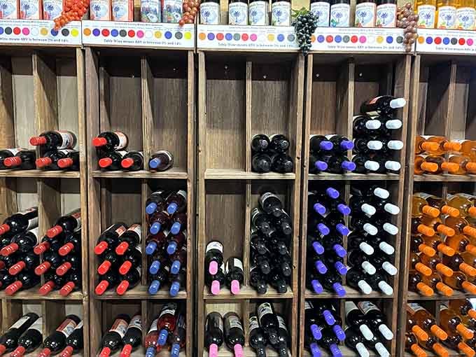 Rows of colorful bottle caps organized like a wine rainbow waiting to make your evening memorable.