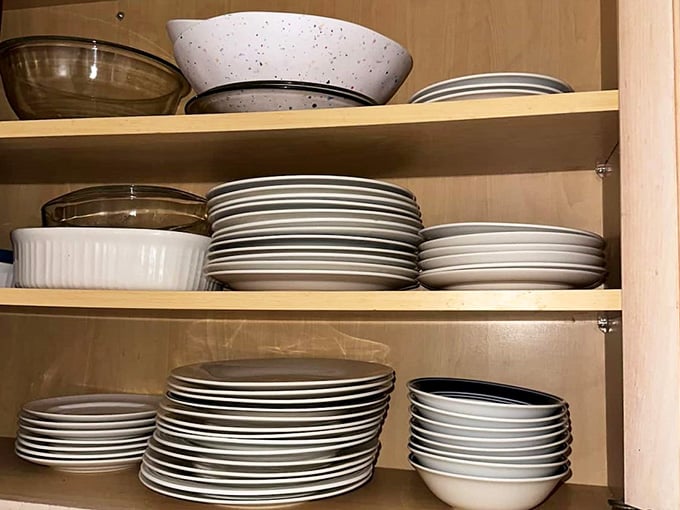 Cabinets stocked with enough dishes to host a proper banquet, no need to eat off your shield tonight.