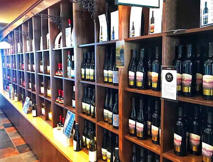 Scores, labels, and stories line these shelves, each bottle quietly competing for the honor of coming home with you.