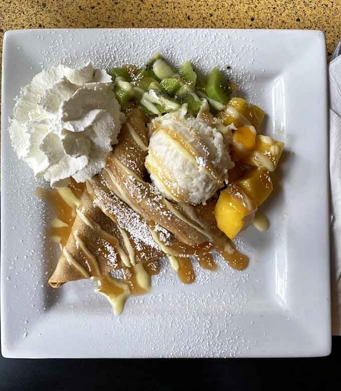 Mango, kiwi, caramel drizzle, and a scoop of coconut &mdash; the Tropicale cr&ecirc;pe is a one-way ticket somewhere warm and wonderful.