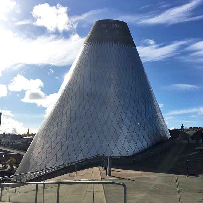 That stainless steel cone isn't just architecture, it's a landmark that says Tacoma means serious business about art.