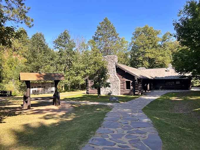 The log and stone visitor center looks like it was built by someone who genuinely loved this place.