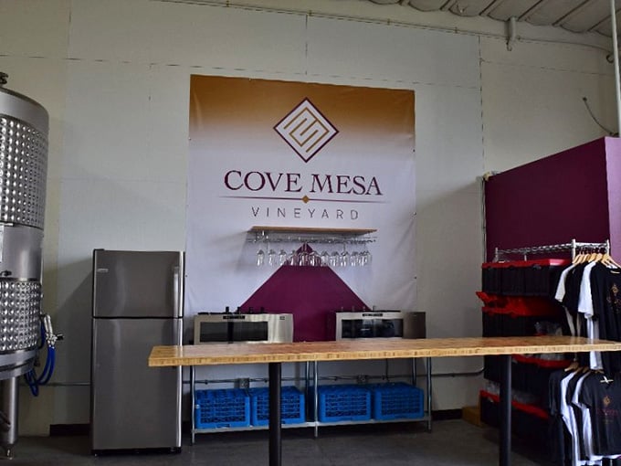 Merchandise, wine racks, and a glowing neon sign, Cove Mesa has turned its tasting room into a full sensory experience.