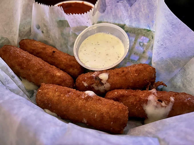 Mozzarella sticks so generously filled that the cheese is already making its escape. No complaints from anyone at this table.