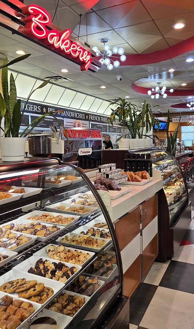 That glowing "Bakery" sign in red neon is basically a beacon calling you toward something wonderful and sweet.
