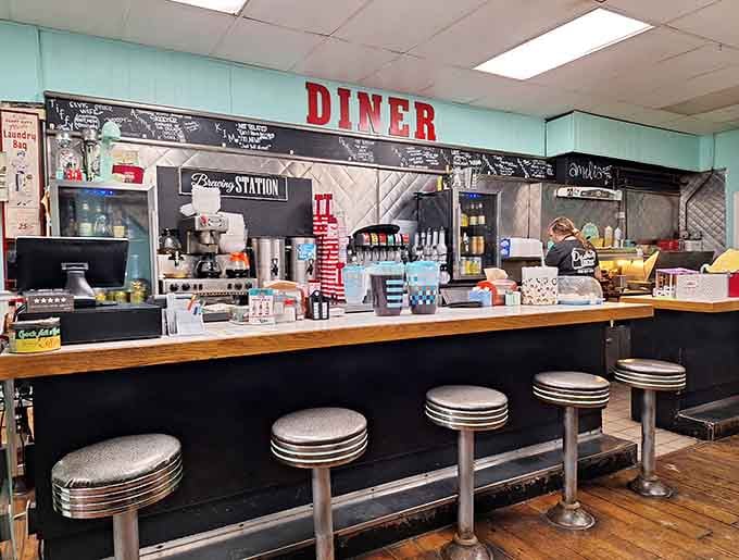 Classic counter stools, a chalkboard full of specials, and a brewing station ready to fuel your whole morning.