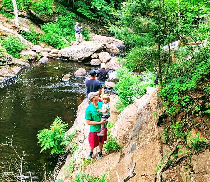 Families exploring the riverbank discover that nature provides better entertainment than any screen ever could.