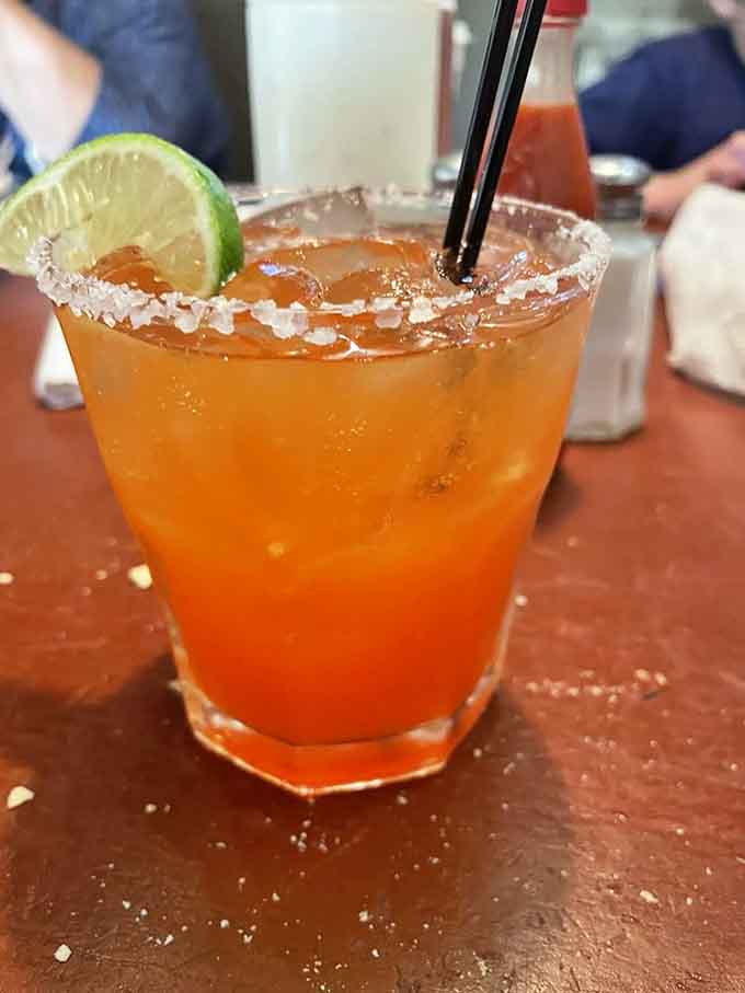 A Michelada with that perfect salted rim, ready to make your taste buds stand up and salute.