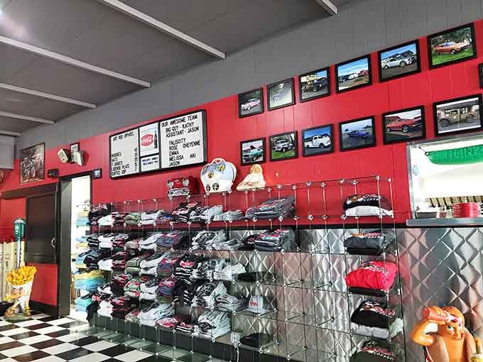 Framed classic car photos, stacked merch, and a team board &mdash; Dutch Mill Cafe takes pride in every corner.