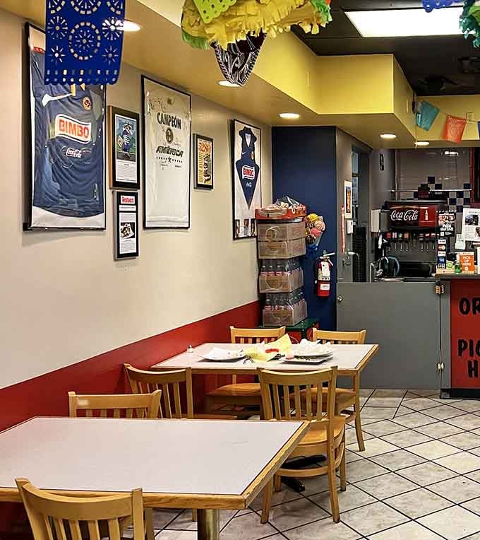 Club Am&eacute;rica jerseys on the wall and papel picado overhead, this dining room has personality to spare.