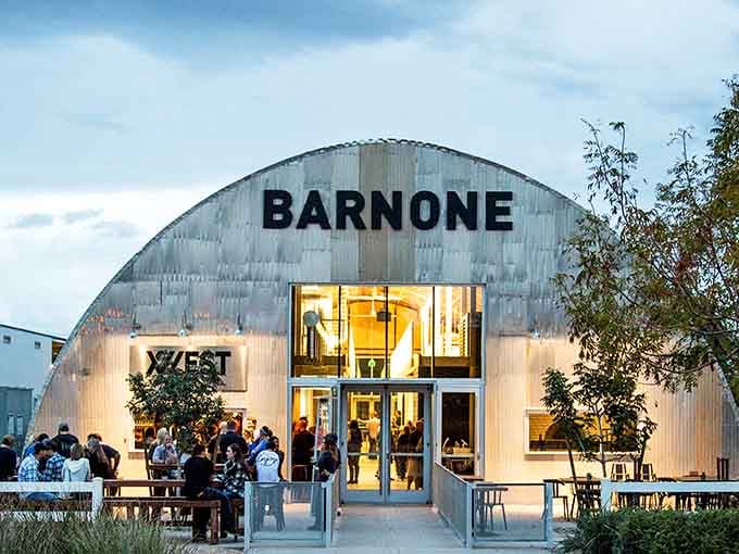 Barn One's curved metal roof is the kind of place that makes you say, "Yes, absolutely, let's go in."